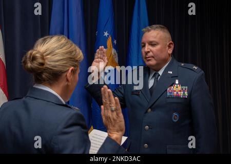 Col. Eric Stringer, 152nd Medical Group commander, speaks to friends ...