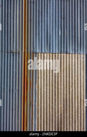 Gray corrugated metal cladding on industrial building roof Stock Photo ...