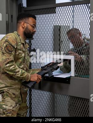 Members of the 436th Military Airlift Wing, dressed in chemical warfare ...