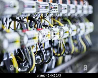 Electric cables conected in control box Stock Photo - Alamy