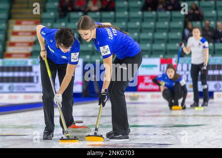 Italy skip Stefania Constantini, right, makes a shot as second Angela ...