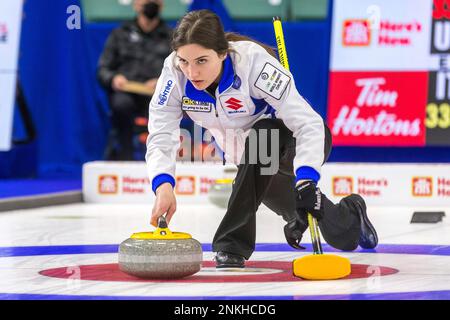 Italy skip Stefania Constantini throws a stone while second Angela ...