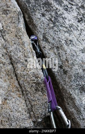Spring loaded camming device, rock climbing protection equipment number ...