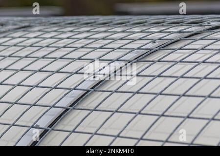 Barrel vault skylight screen fall protection guard installed on a ...