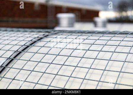 Barrel vault skylight screen fall protection guard installed on a ...