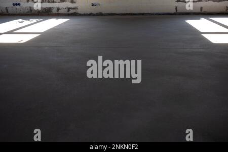 The leveled rough floor in a house under construction with a semi-dry ...