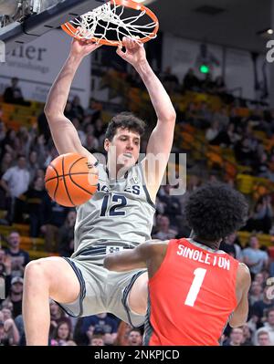 Utah State center Szymon Zapala (12) grabs an offensive rebound in ...