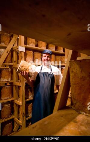 Stichelton Raw Milk Blue Cheese production Stock Photo - Alamy