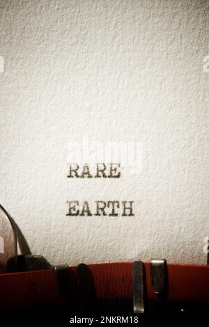 Rare earth text written with a typewriter Stock Photo - Alamy