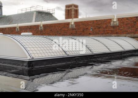 Barrel vault skylight screen fall protection guard installed on a ...