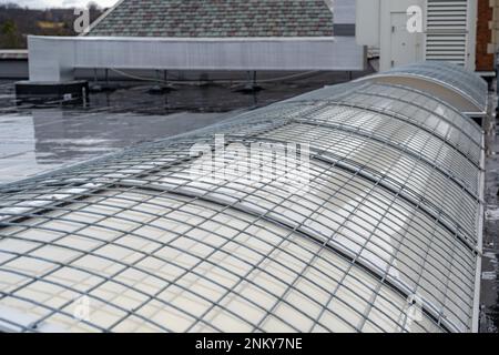 Barrel vault skylight screen fall protection guard installed on a ...