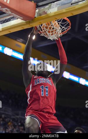 Arizona Wildcats center Oumar Ballo (11) blocks a shot by UCLA Bruins ...