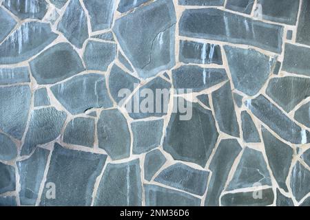 a olive green stone slabs wall Stock Photo - Alamy