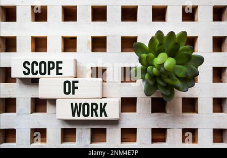 Scope of Work symbol. Concept words Scope of Work on wooden blocks ...