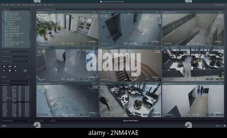 Playback CCTV cameras in office on computer screen. Surveillance interface with AI futuristic ...