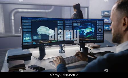 Engineers check aerodynamics of eco-friendly electric car in lab for ...