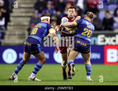 Wigan Warriors' Jake Wardle is tackled by Catalans Dragons' Ugo Tison ...