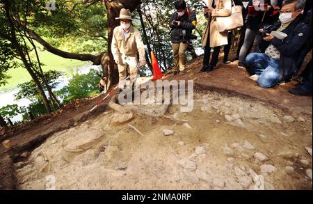 A row of cylindrical clay figures is excavated at an ancient tomb "Mozu ...