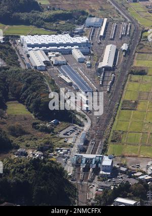 An aerial photo shows a Keisei Electric Railway train car stopped by a ...