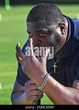 Former NFL player Devin Wyman speaks during his motivational ...