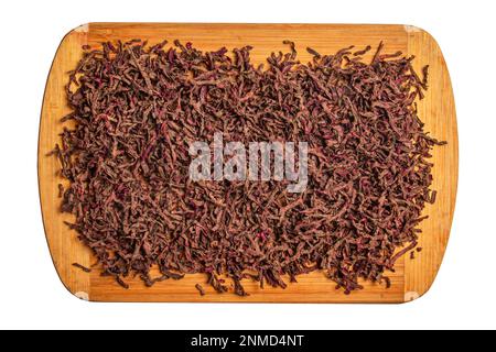 Dried beetroot flakes. Dehydrated edible beets. Food background ...