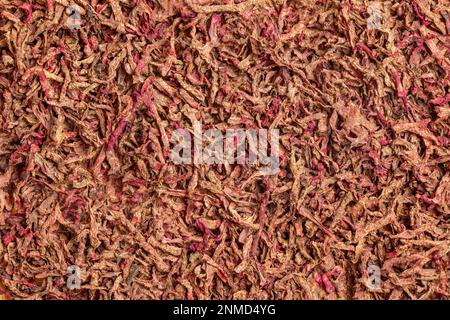 Dried beetroot flakes. Dehydrated edible beets. Food background ...