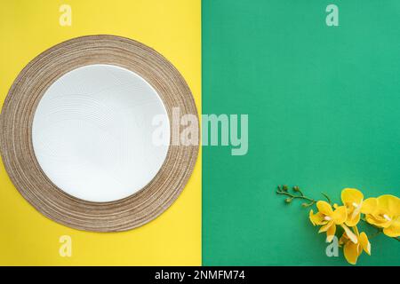 Western table setting with traditional table mat and dinnerware with ...