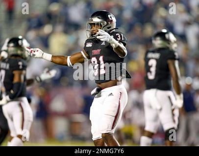 October 9, 2021: Troy Trojans safety Dell Pettus (31) flexes some ...