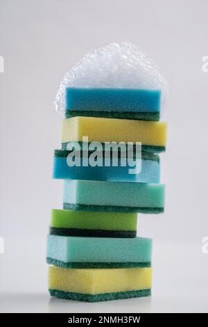 Lined up plaster sponges with foam Stock Photo - Alamy