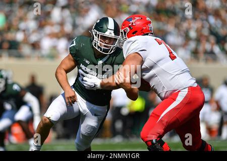 EAST LANSING, MI - SEPTEMBER 11: Michigan State Spartans running back Kenneth Walker (9) sizes ...