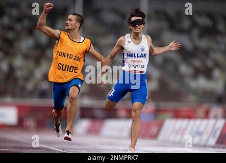 Athanasios Ghavelas of Greece and his guide Sotirios Gkaragkanis ...