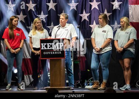 Georgia Gov. Brian Kemp and his family walk to the Georgia State ...