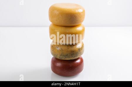 Different types of homemade traditional Bosnian cheese isolated on a ...
