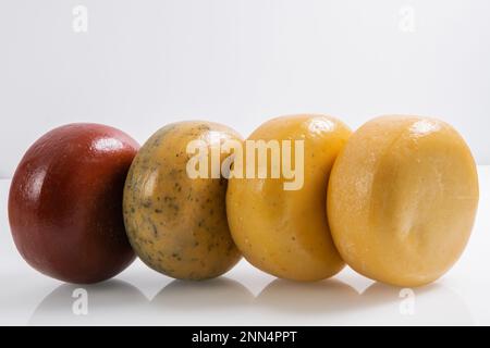 Different types of homemade traditional Bosnian cheese isolated on a ...