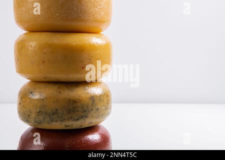 Different types of homemade traditional Bosnian cheese isolated on a ...