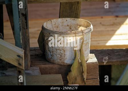 old plastic bucket of garbage, in the village Stock Photo - Alamy