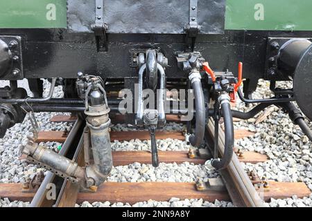 Coupling and air line on an old railroad car Stock Photo - Alamy