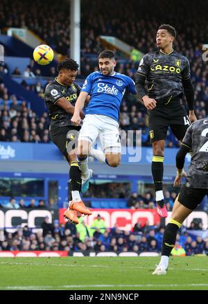 Tyrone Mings of Aston Villa heads the ball over during the Premier ...
