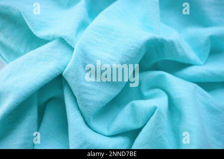Wrinkled pale blue jersey, soft fabric wavy background Stock Photo - Alamy