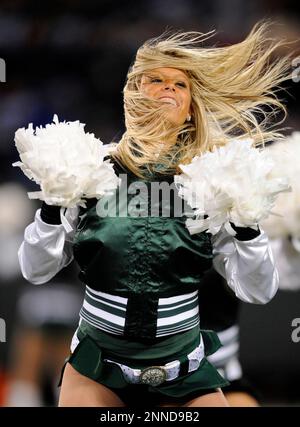 18 October 2009: A member of the New York Jets flight crew performs ...