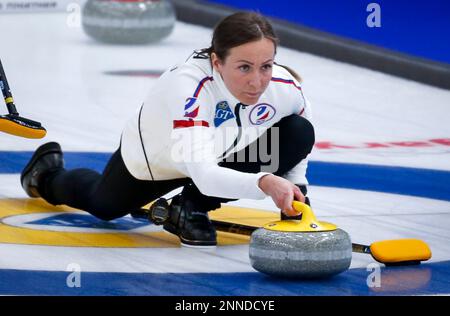 Russia skip Alina Kovaleva makes a shot against Italy at the women's ...