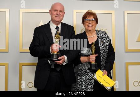 Donald Graham Burt, left, and Jan Pascale pose with the award for best ...