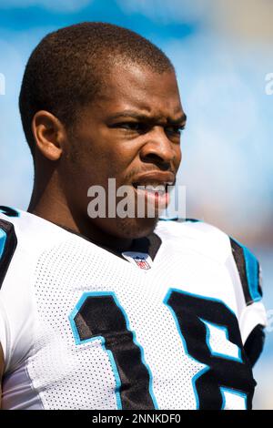 Carolina Panthers D.J. Hackett (18) makes a catch over Curtis Deloatch ...