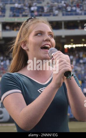 10 Aug 2002: Andy Reid's wife is interviewed after her daughter sings ...