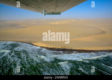 Aerial view of Sandwich Harbour, where the Namib desert meets the ...