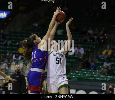 Baylor forward Caitlin Bickle, right, reaches in on Kansas guard ...
