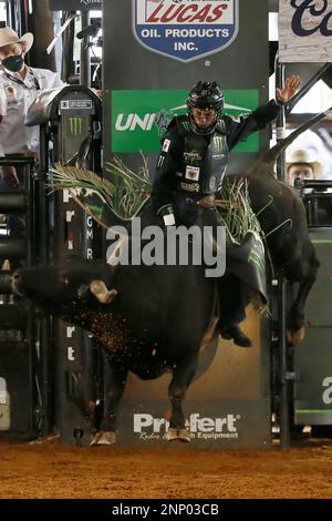 OKEECHOBEE, FL - JANUARY 30: Marco Eguchi rides bull Smooth Operator ...
