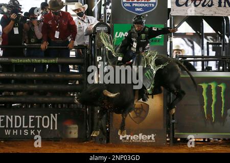 OKEECHOBEE, FL - JANUARY 30: Marco Eguchi rides bull Smooth Operator ...