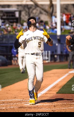 Milwaukee Brewers center fielder Garrett Mitchell catches a fly ball ...