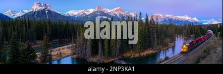 Train passing through Rocky Mountain, Alberta, Canada Stock Photo - Alamy